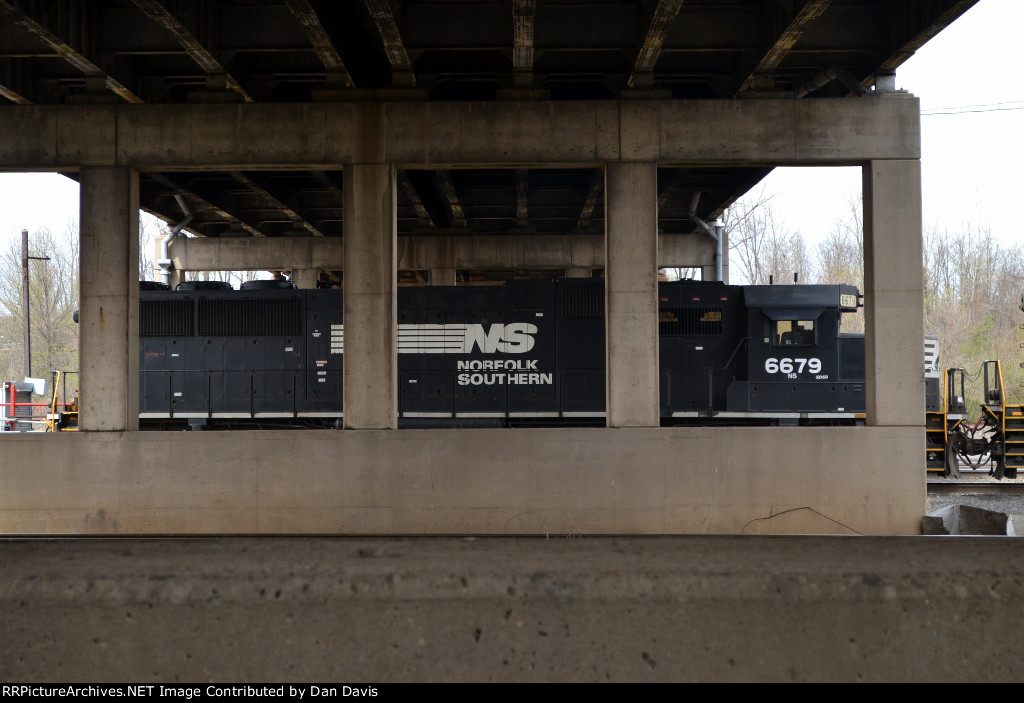 NS SD60 6679 sitting under the Route 13 bridge